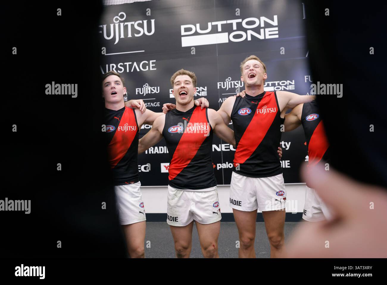 Perth, Australia. 18th Apr, 2025. The Bombers sing their club song ...