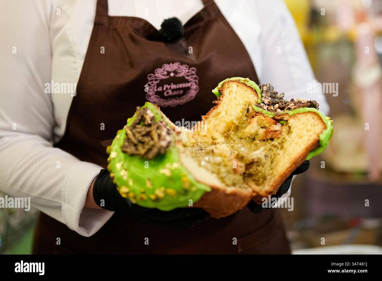 Alla Komissarova, owner of La Princesse Choco pastry shop displays a ...