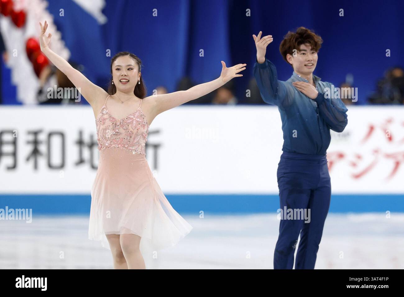Utana Yoshida (L) and Masaya Morita of Japan wave after performing in ...