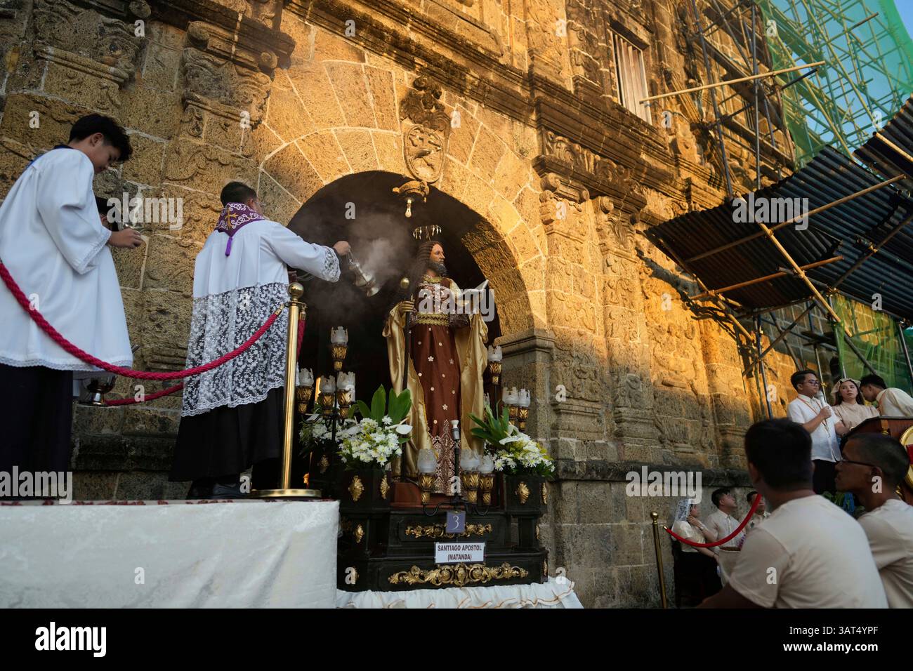 A Catholic priest performs a ritual as part of lenten practice to mark ...