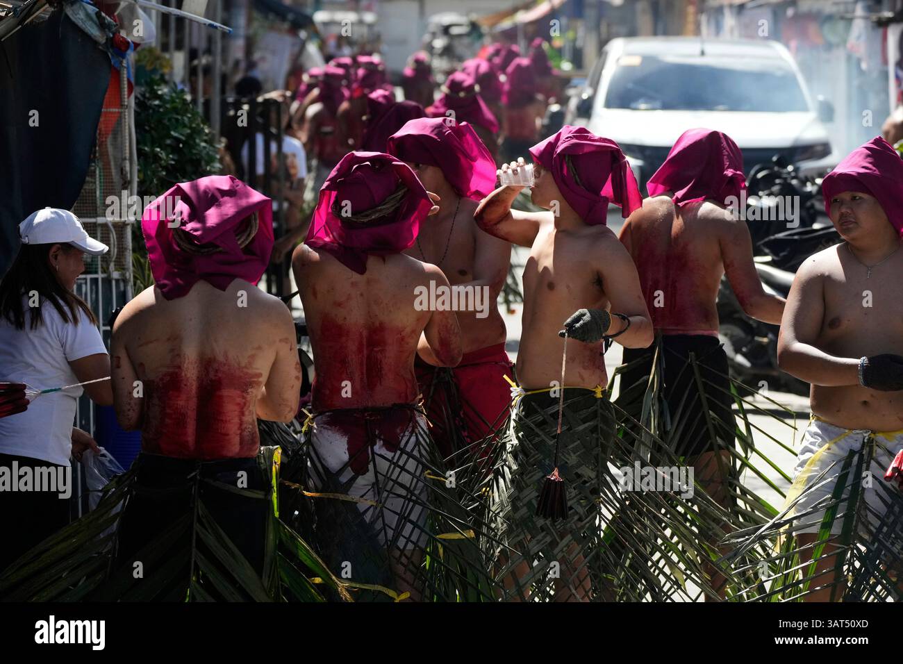Baby Ragaza distributes boiled eggs and drinking water for penitents ...