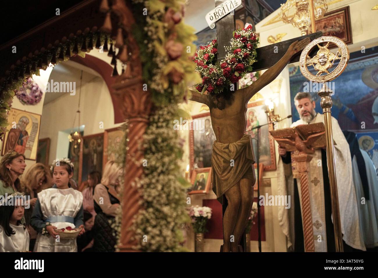 Believers attend the Good Friday reenactment of Deposition of Jesus ...