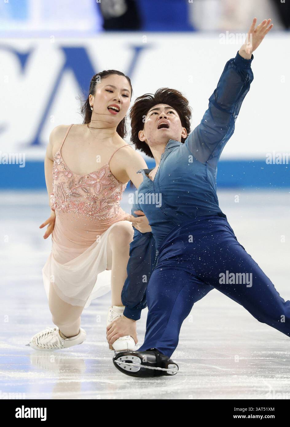Utana Yoshida (L) and Masaya Morita of Japan perform in the ice dance ...