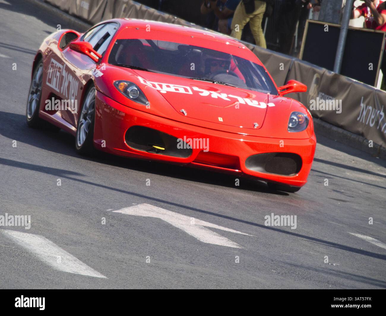 June 13, 2013 - Jerusalem, Israel - A Ferrari 430 GT Challenge passes ...