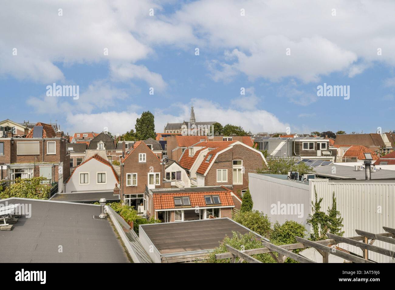 A scenic view of rooftops showcasing a blend of modern and historic ...