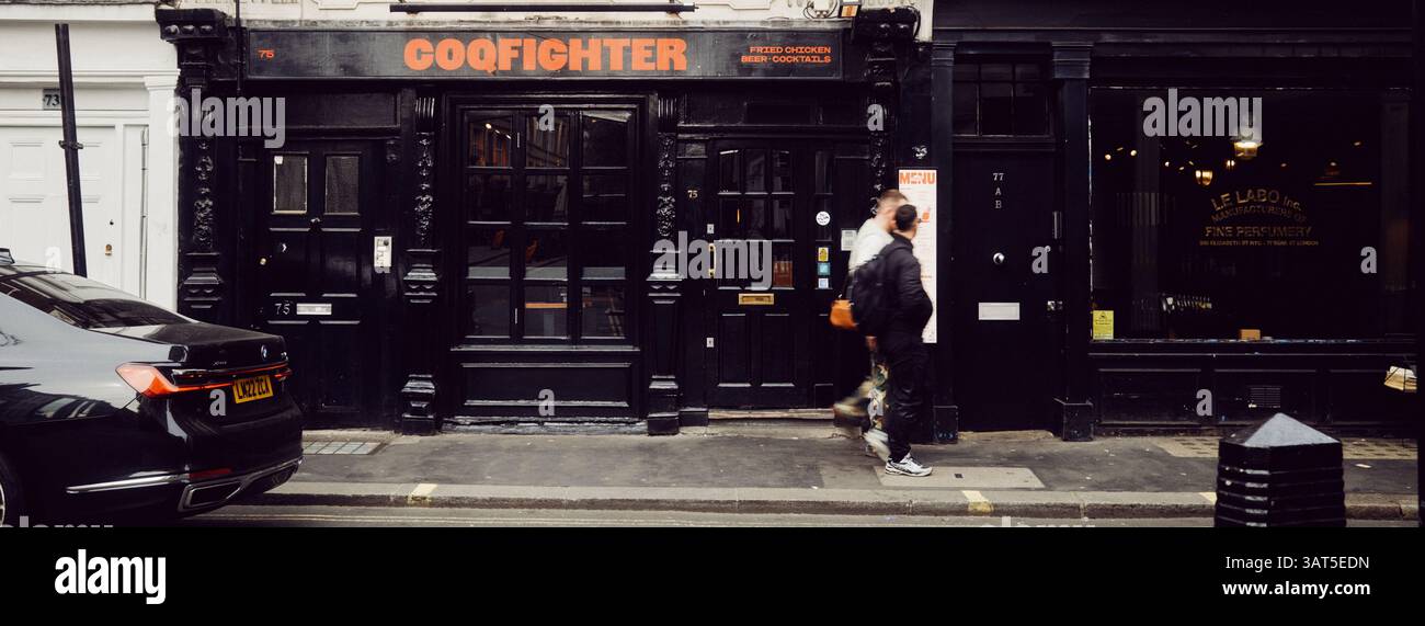 London, UK - March 25, 2025: Coqfighter fried chicken shop and Le Labo ...