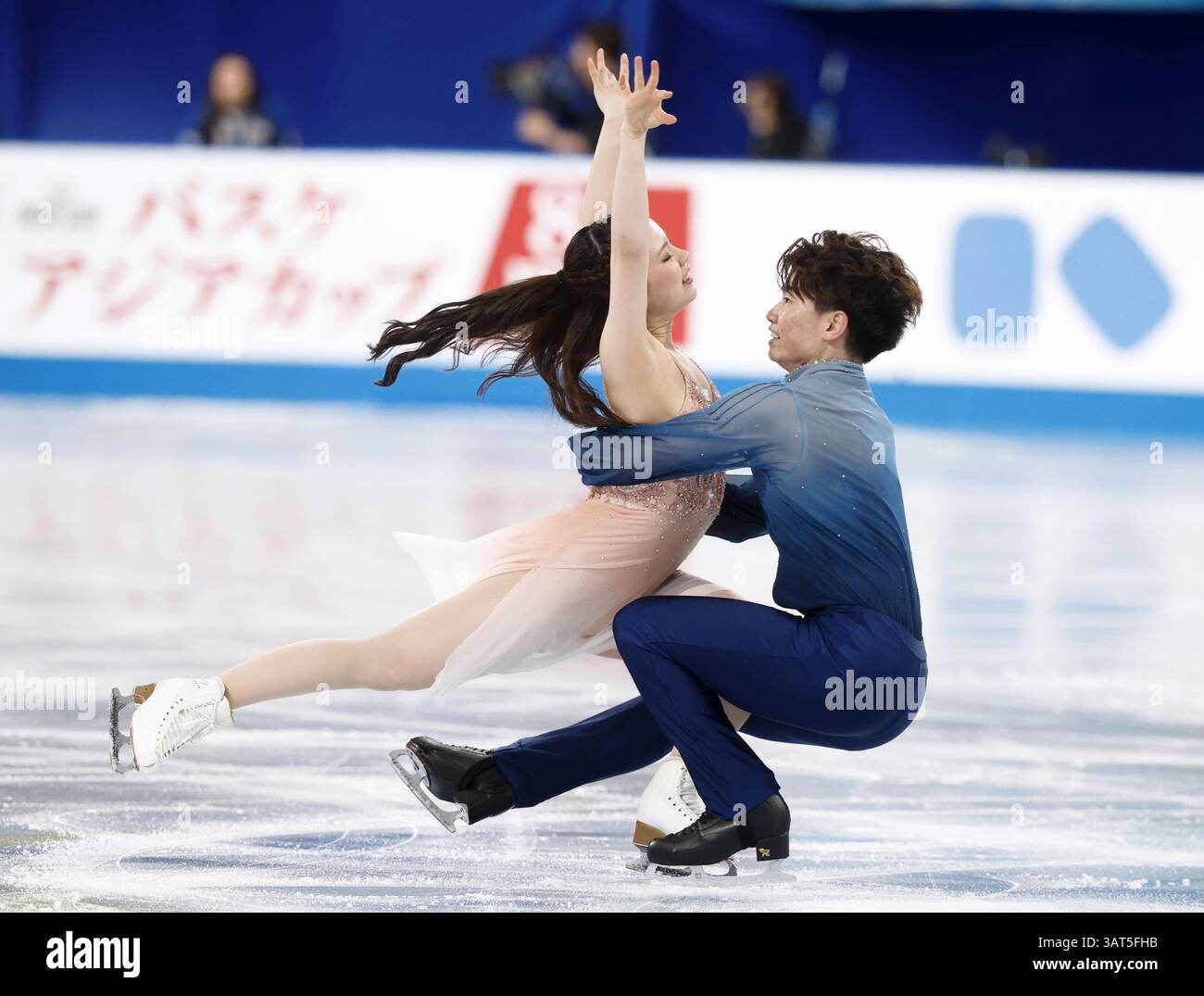 Utana Yoshida (L) and Masaya Morita of Japan perform in the ice dance ...