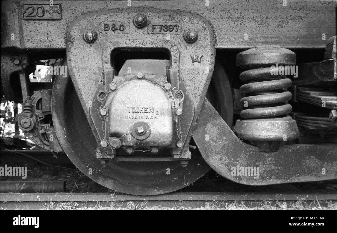 close-up of rail car wheel and spring Stock Photo - Alamy