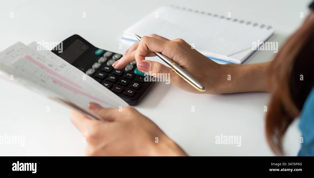 Expense Calculation and Budgeting. An individual engaged in calculating ...