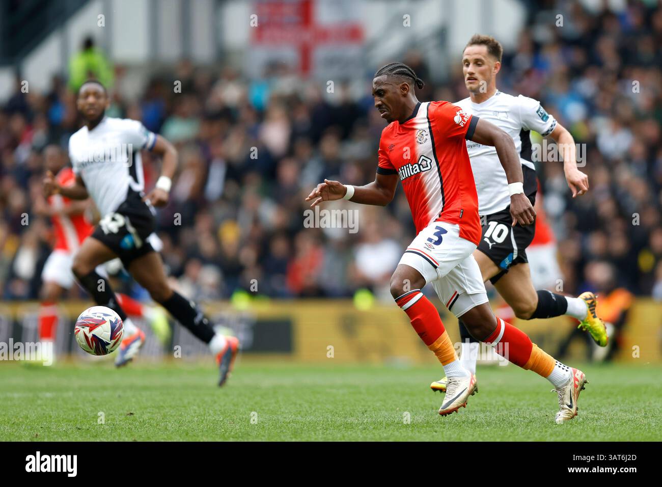 Luton Town's Amari'i Bell and Derby County's Jerry Yates (right) battle ...