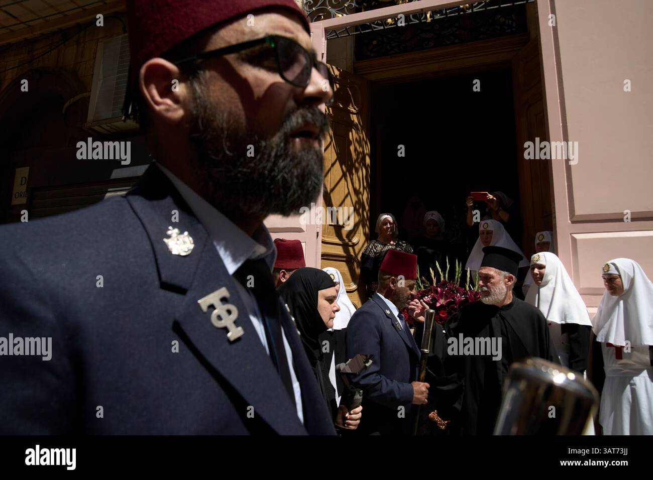 Nuns and ceremonial guards and Orthodox Christian clergy take part in ...