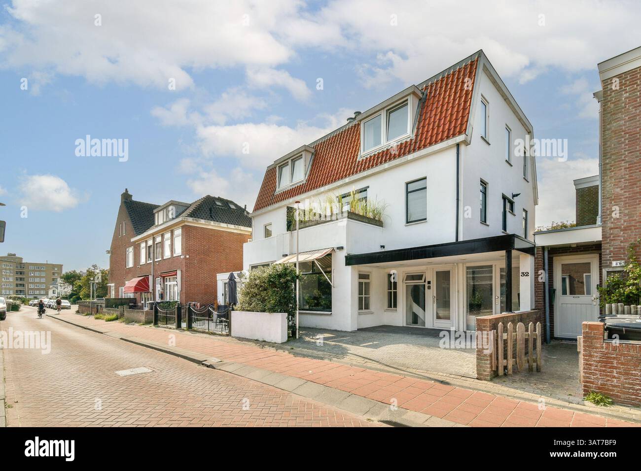 A picturesque modern residential street featuring various architectural ...