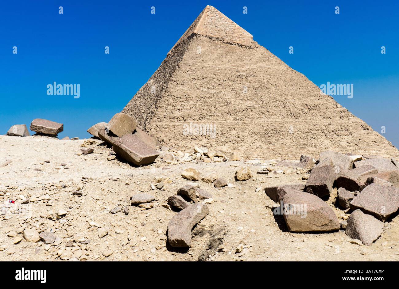A close-up view of a pyramid in Egypt, showcasing its massive stone ...