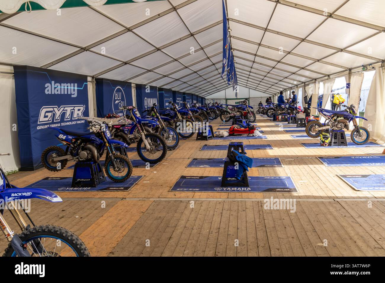 Winchester, UK- October 5, 2024: Yamaha race tent lined with multiple ...