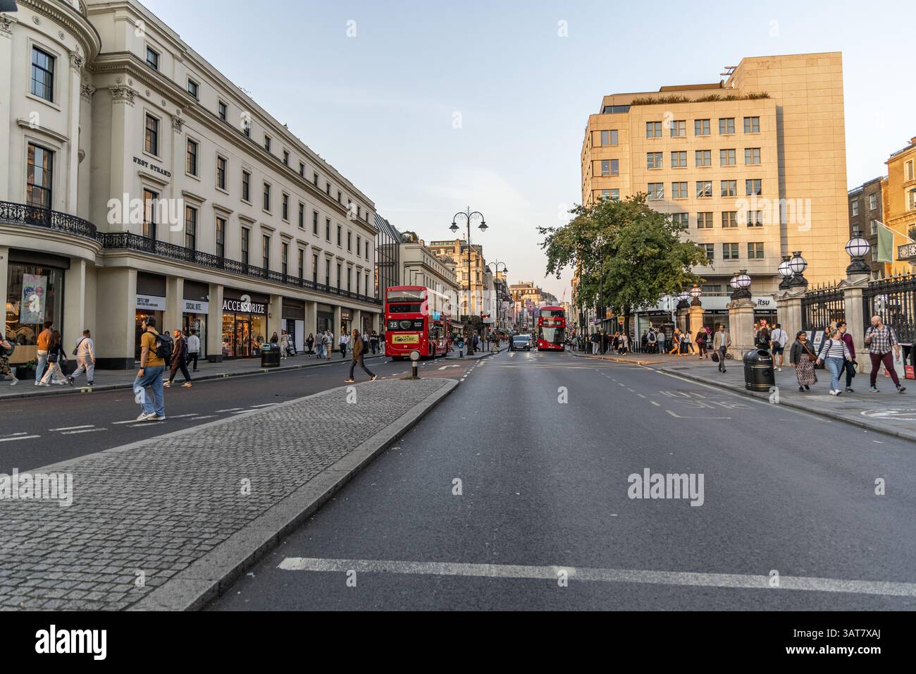 London, UK- September 19, 2024: Late Afternoon on The Strand: Red ...