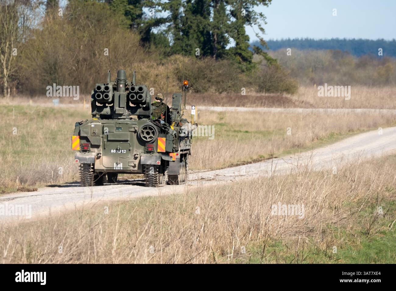 a Bulldog FV432 towing a British army Alvis Stormer tank equipped with ...