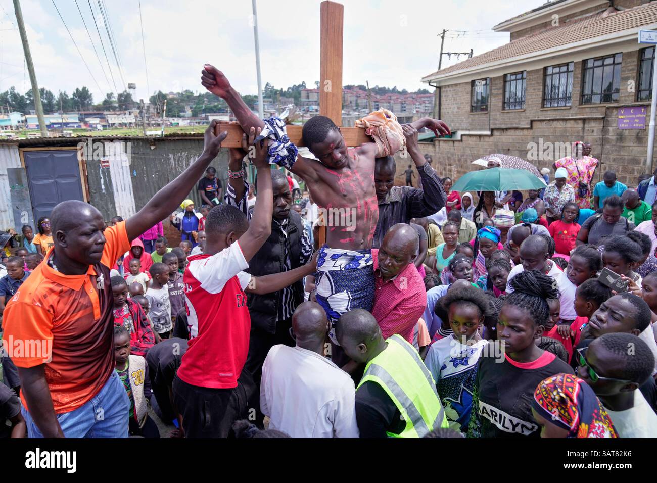 Christians reenact the crucifixion of Jesus Christ in a Way of the ...