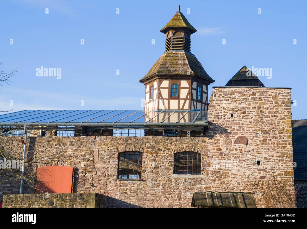 Old castle with modern photovoltaic system as the roof of the concert ...