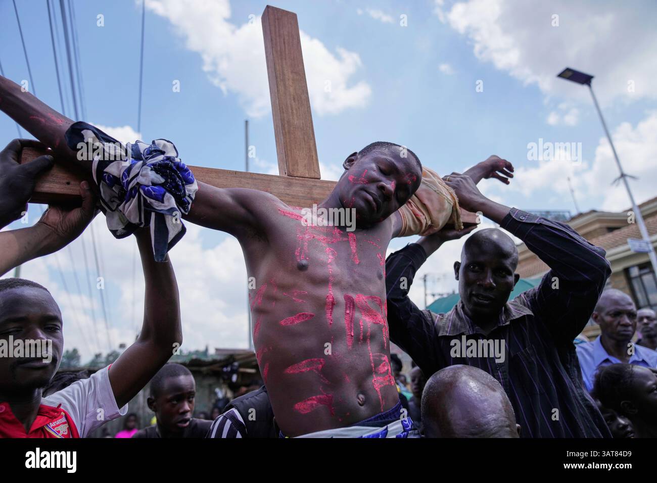Christians reenact the crucifixion of Jesus Christ in a Way of the ...