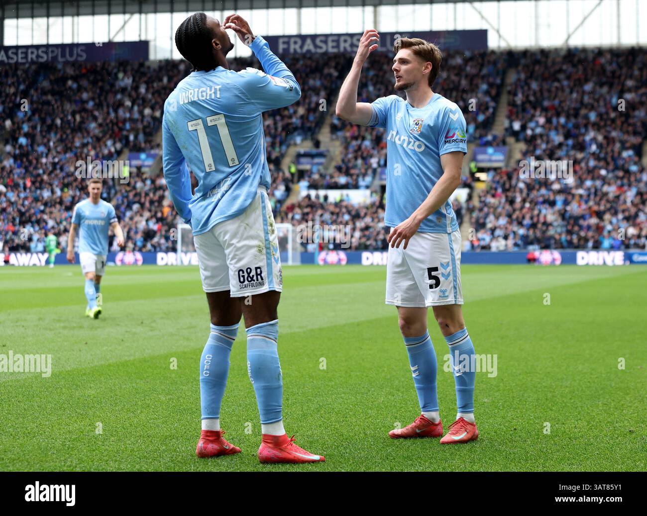 Coventry City's Jack Rudoni (right) celebrates scoring their side's ...