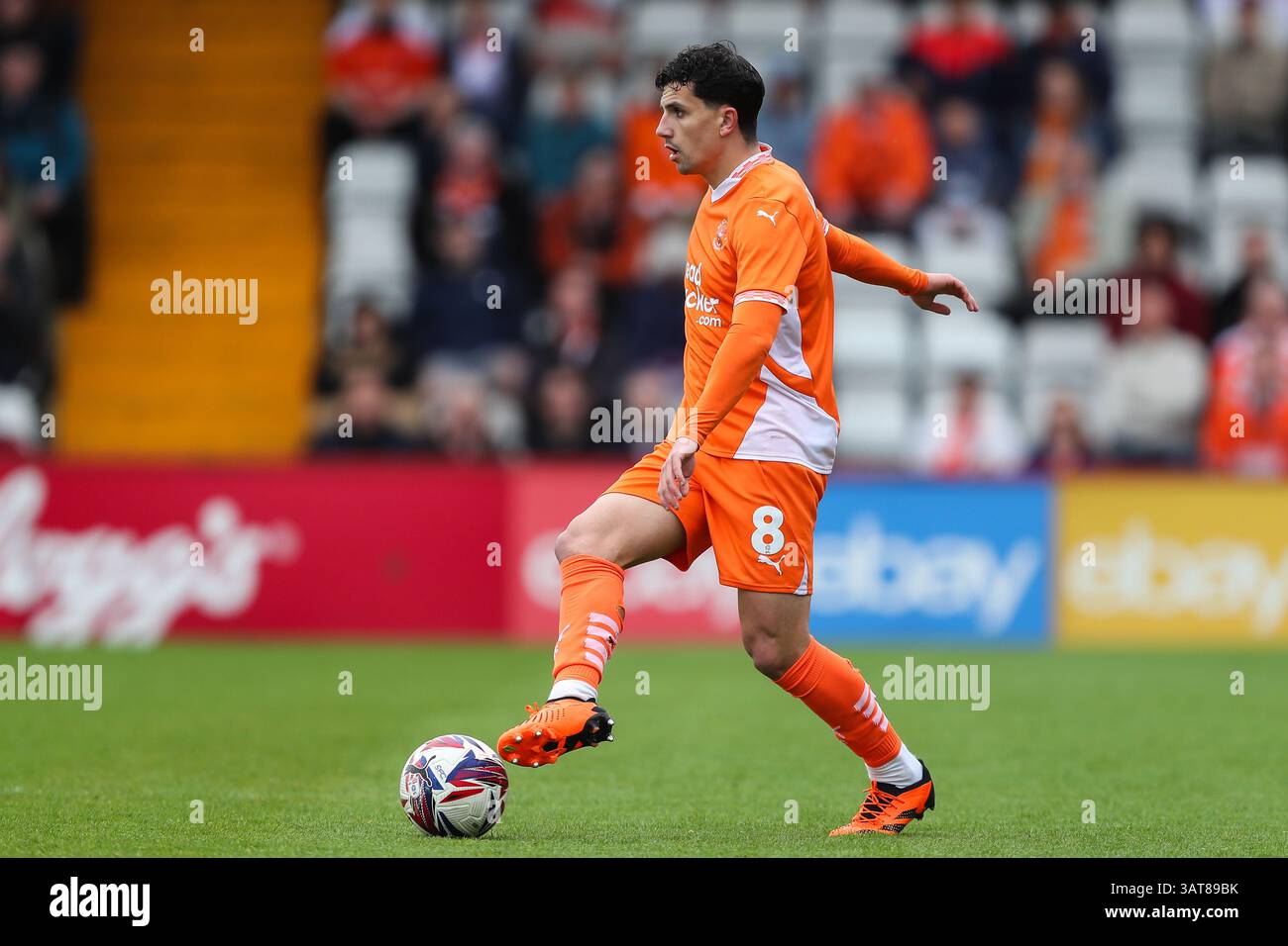 Stevenage, UK. 18th Apr, 2025. Albie Morgan of Blackpool controls the ...