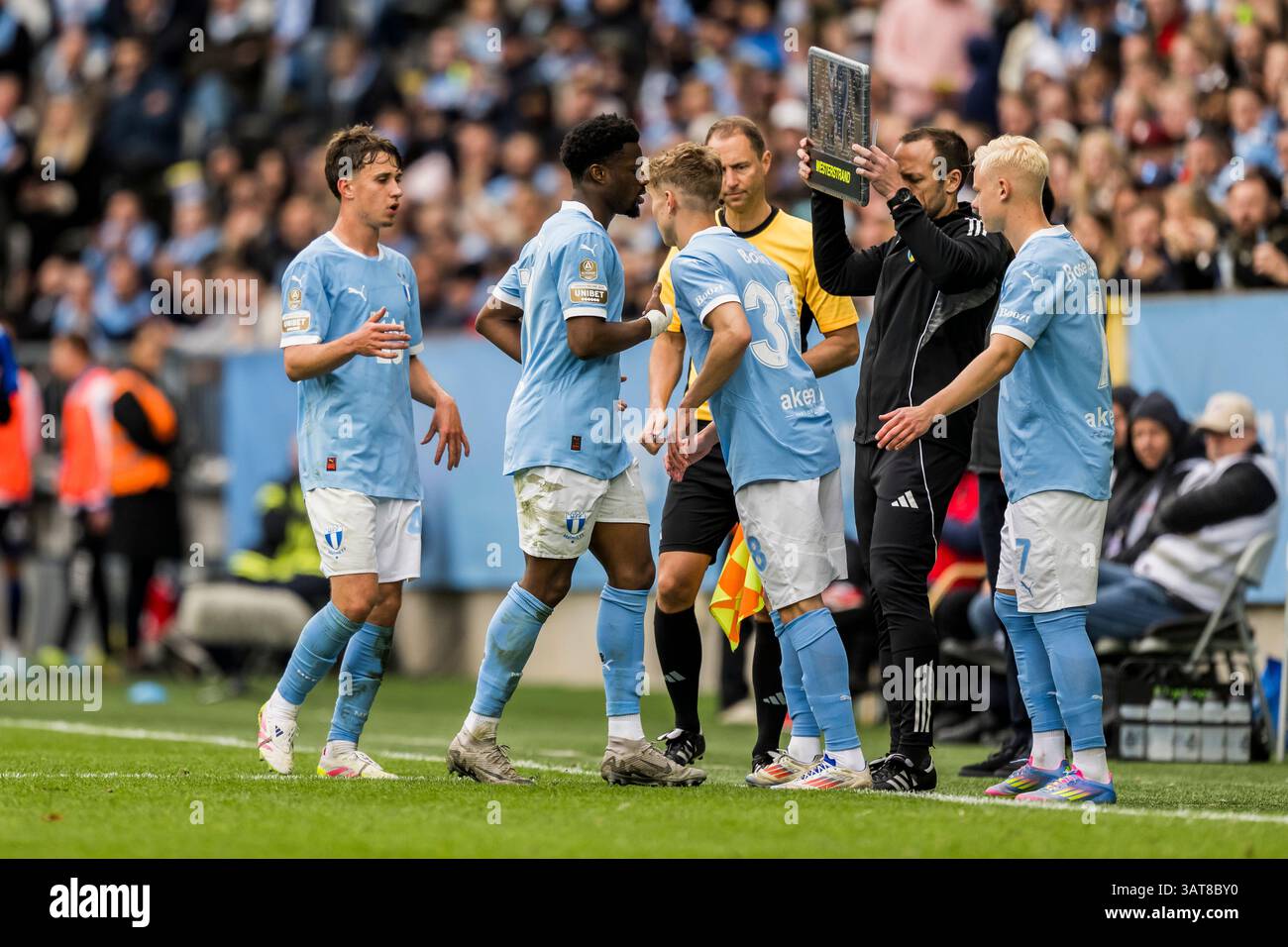 250418 Malmö FFs Kenan Busuladzic och Emmanuel Ekong byter med Hugo ...