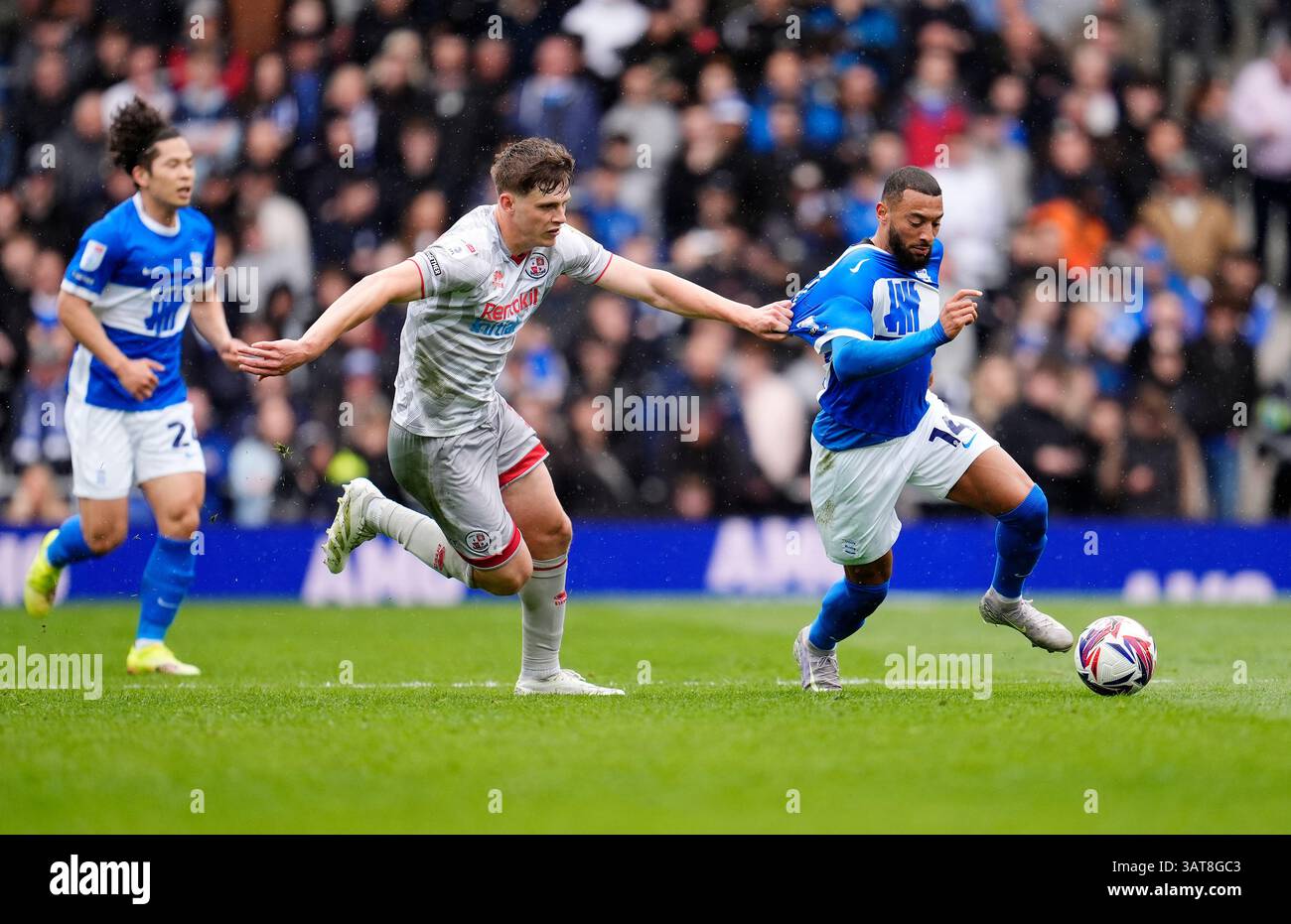 Birmingham City's Keshi Anderson (right) and Crawley Town's Ben ...