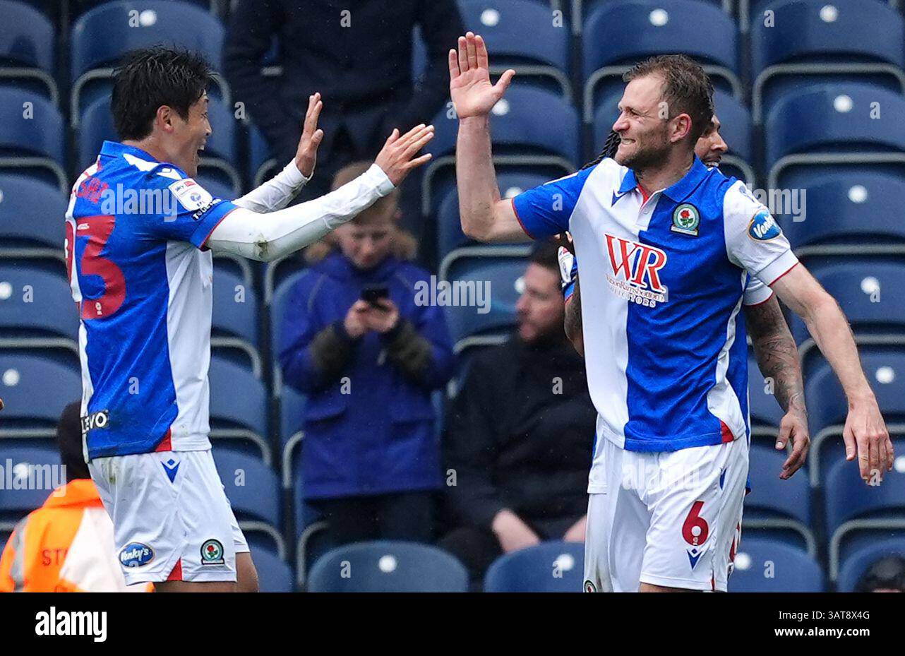 Blackburn Rovers' Sondre Tronstad (right) celebrates scoring their side ...