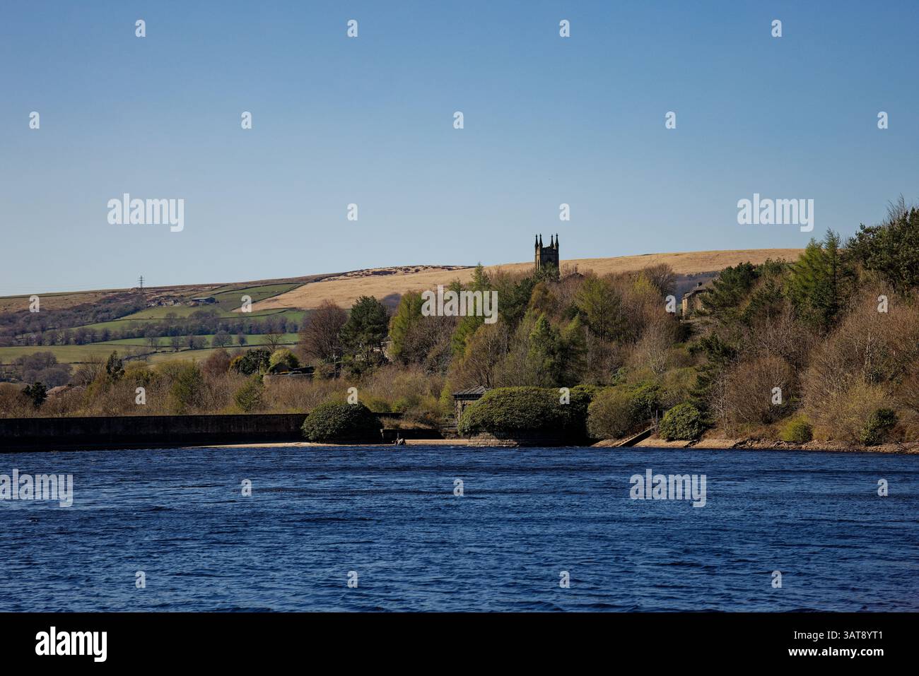 The church tower of St John the Baptist at Tintwistle rises above the ...