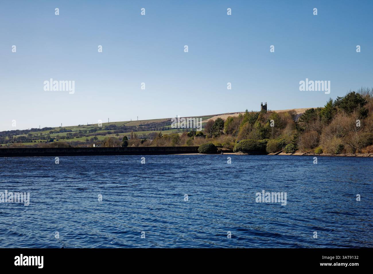 The church tower of St John the Baptist at Tintwistle rises above the ...