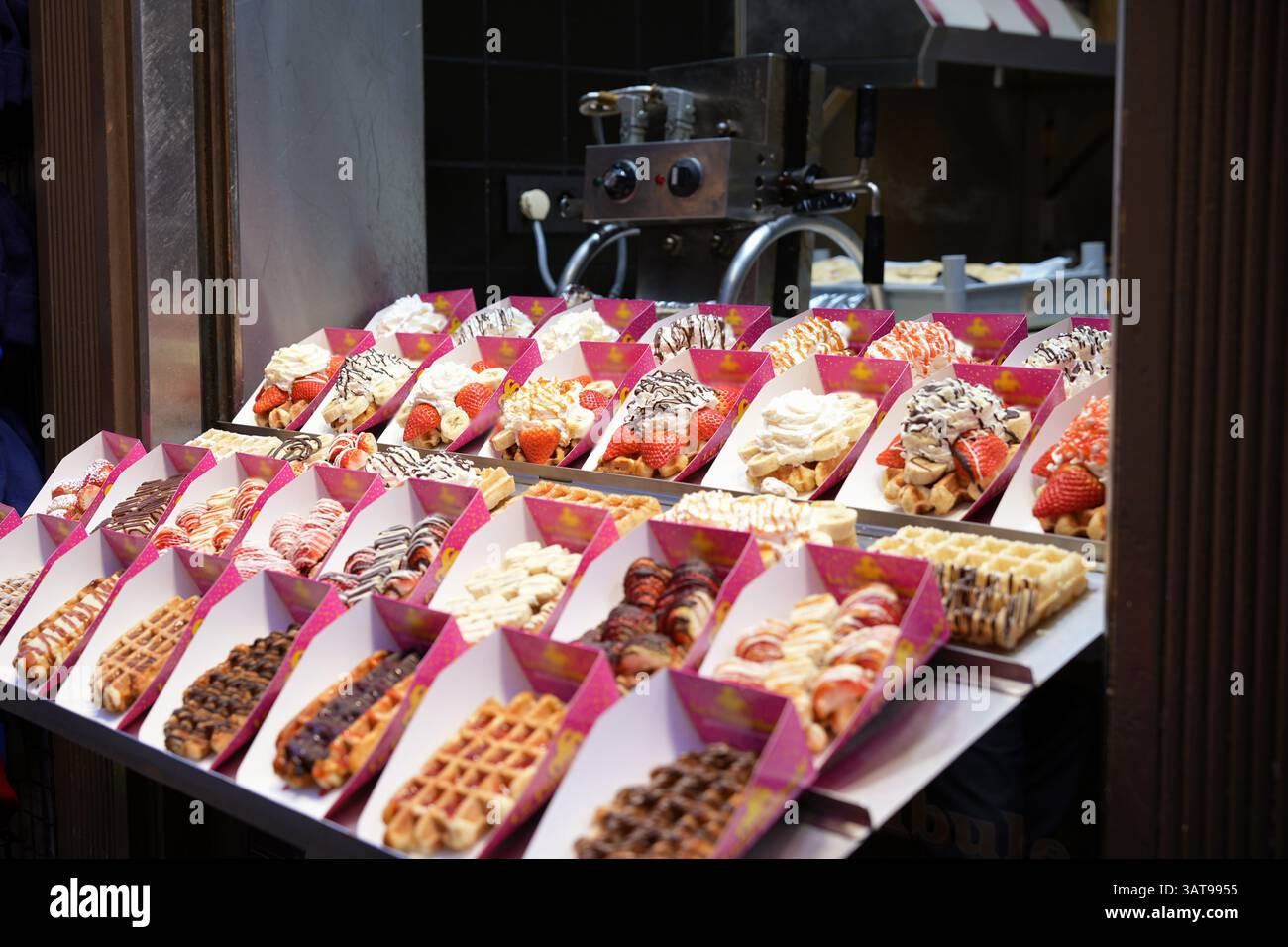 Colorful Display of Belgian Waffles with Toppings at Street Vendor ...