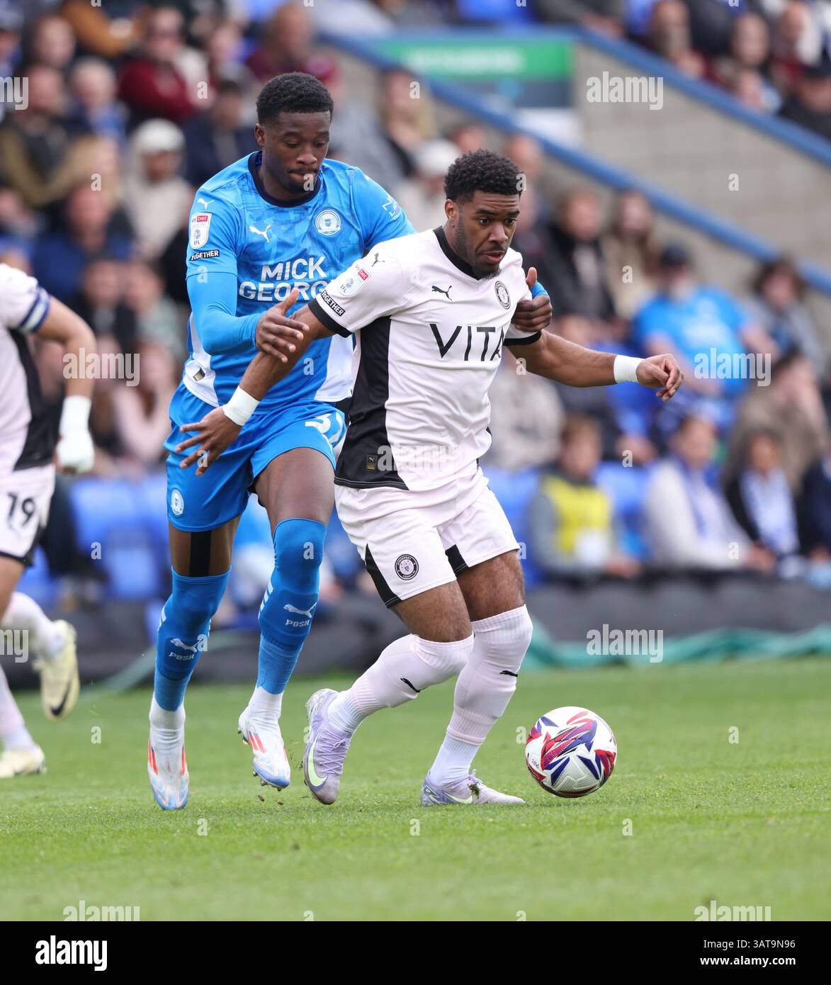 Peterborough, UK. 18th Apr, 2025. Emmanuel Fernandez (PU) Jayden ...