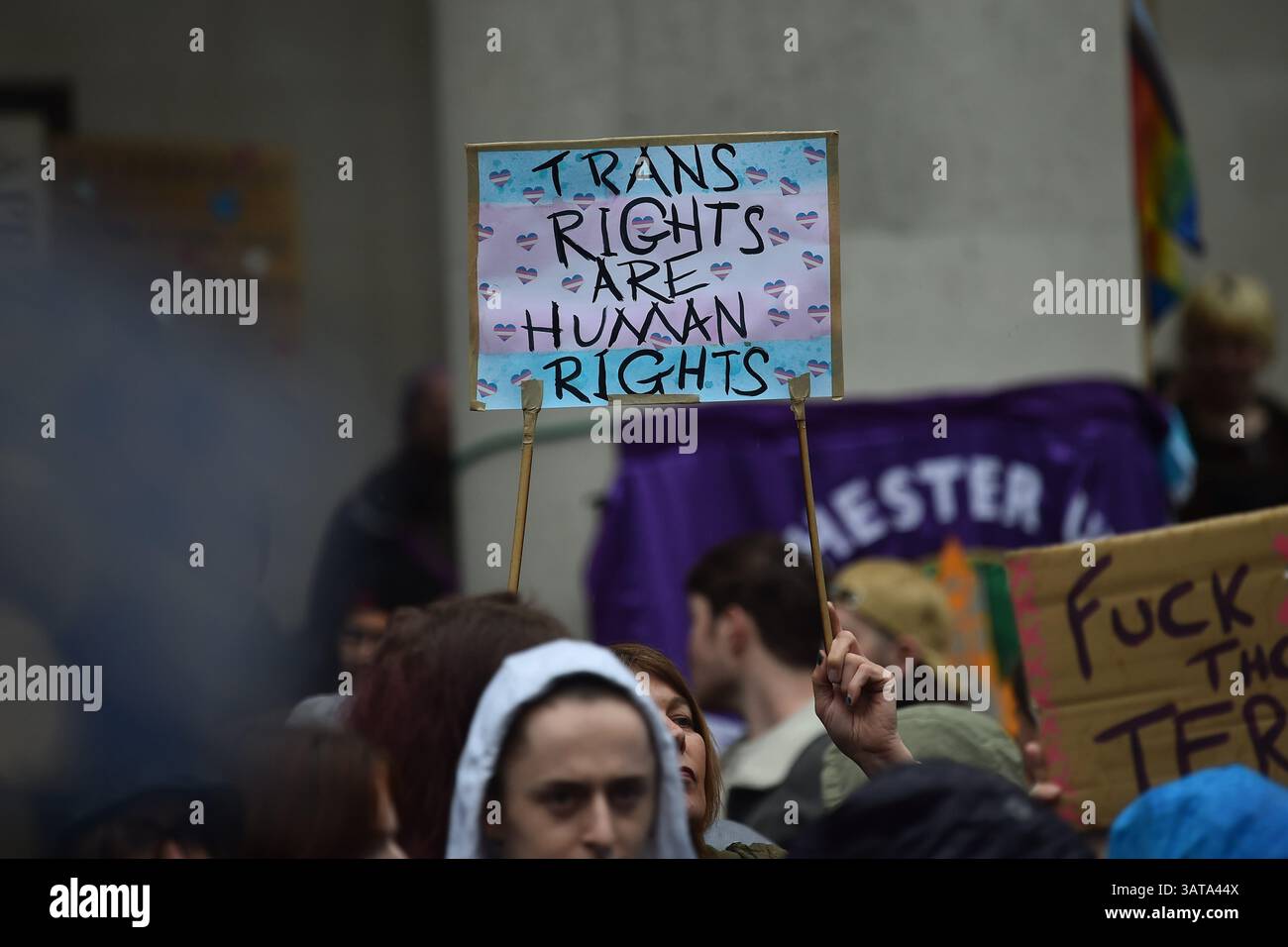 A "Trans Rights Are Human Rights" placard at a trans rights rally at St ...