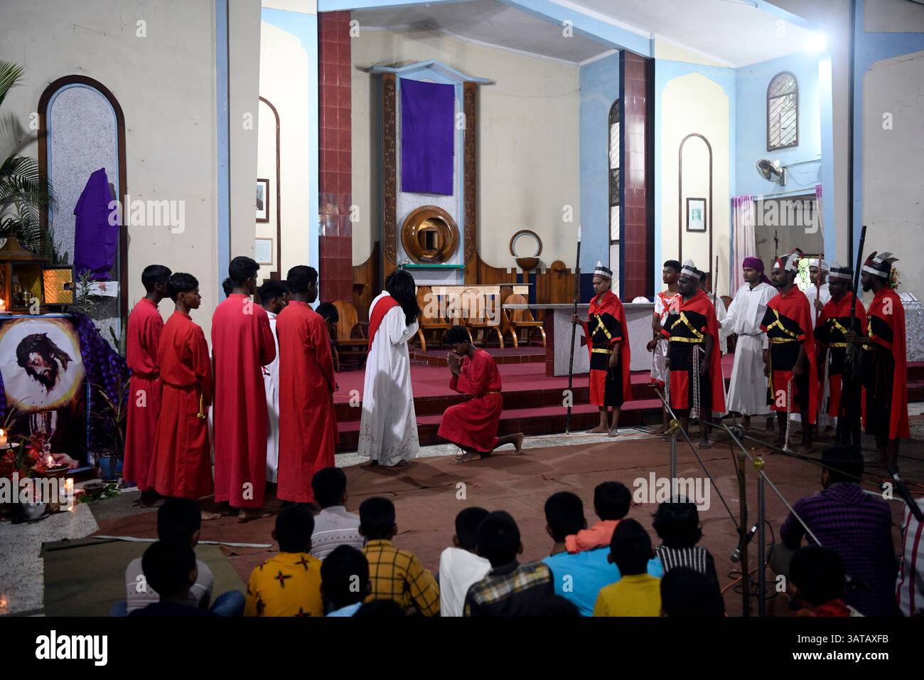 Judas Iscariot betrays Jesus Christ to his enemies during a reenactment ...