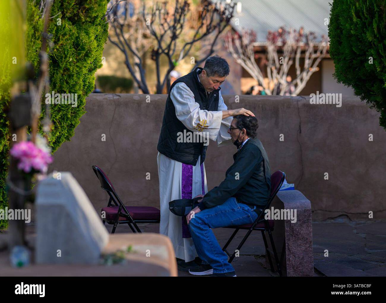 Daniel Arona of Albuquerque receives a blessing from Friar Sebastian ...