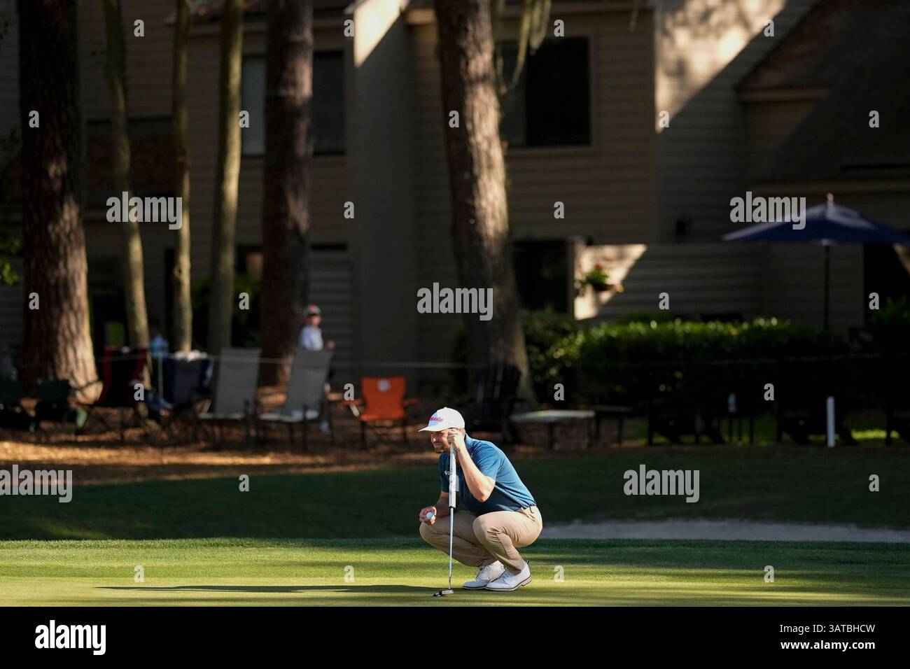 Wyndham Clark lines up a putt on the second green during the second ...