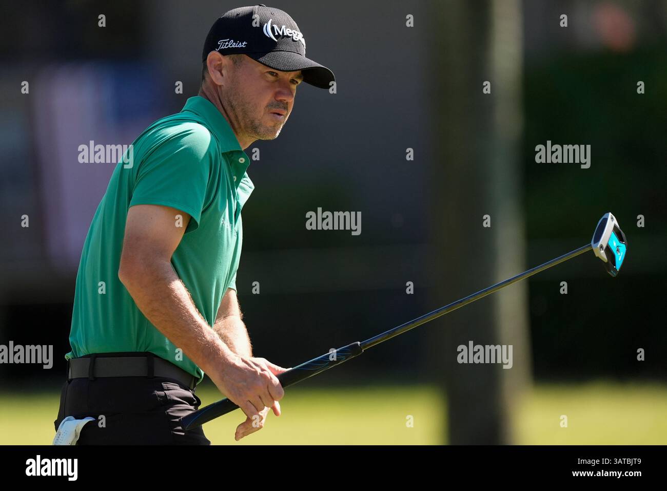 Brian Harman watches his ball on the second green during the second ...