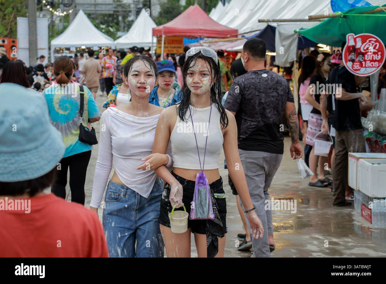Two young women enjoy the Songkran festival in Mae Sot, Thailand. The ...
