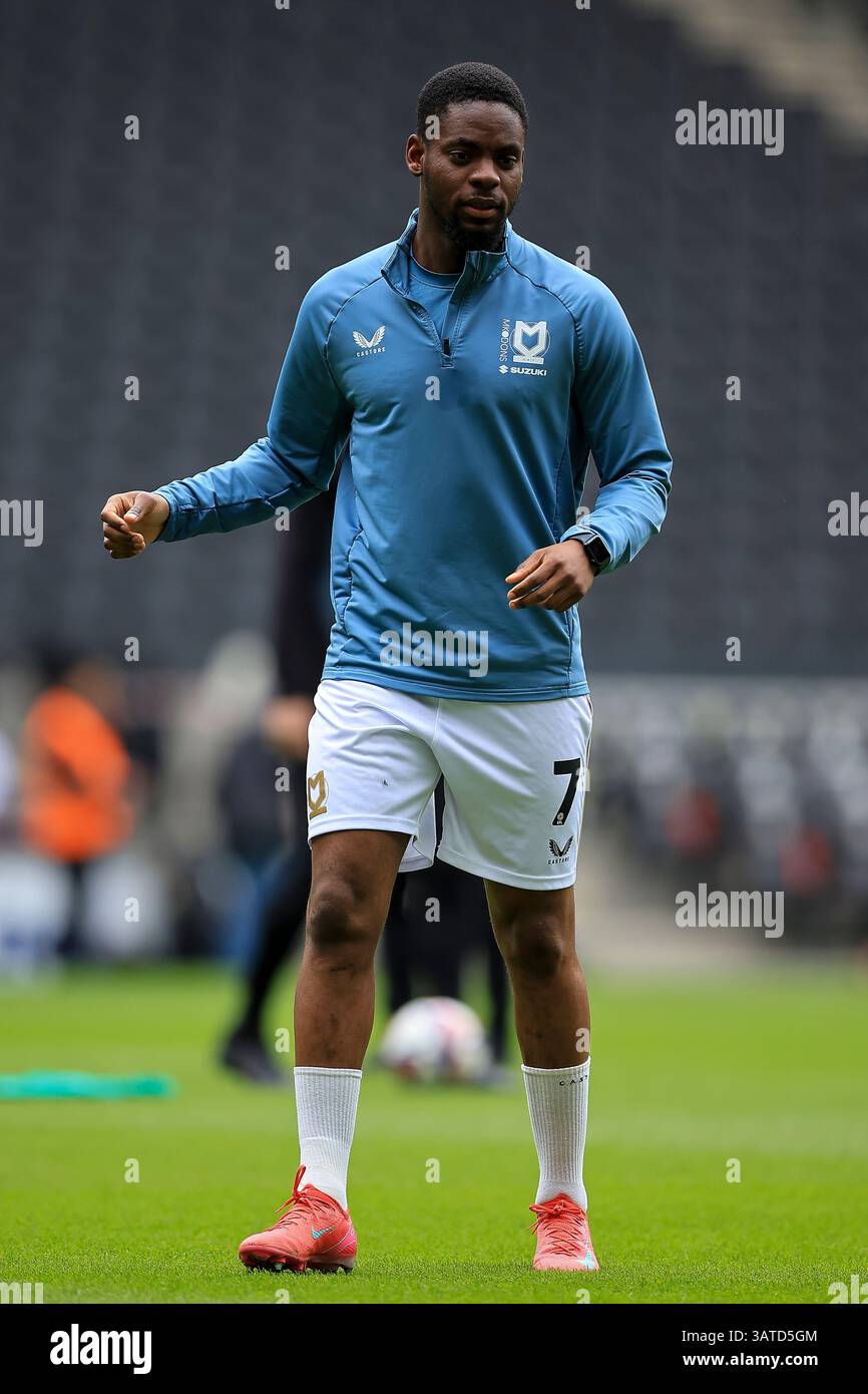 Milton Keynes Dons Forward Jonathan Leko (7) Warms Up before kick-off ...