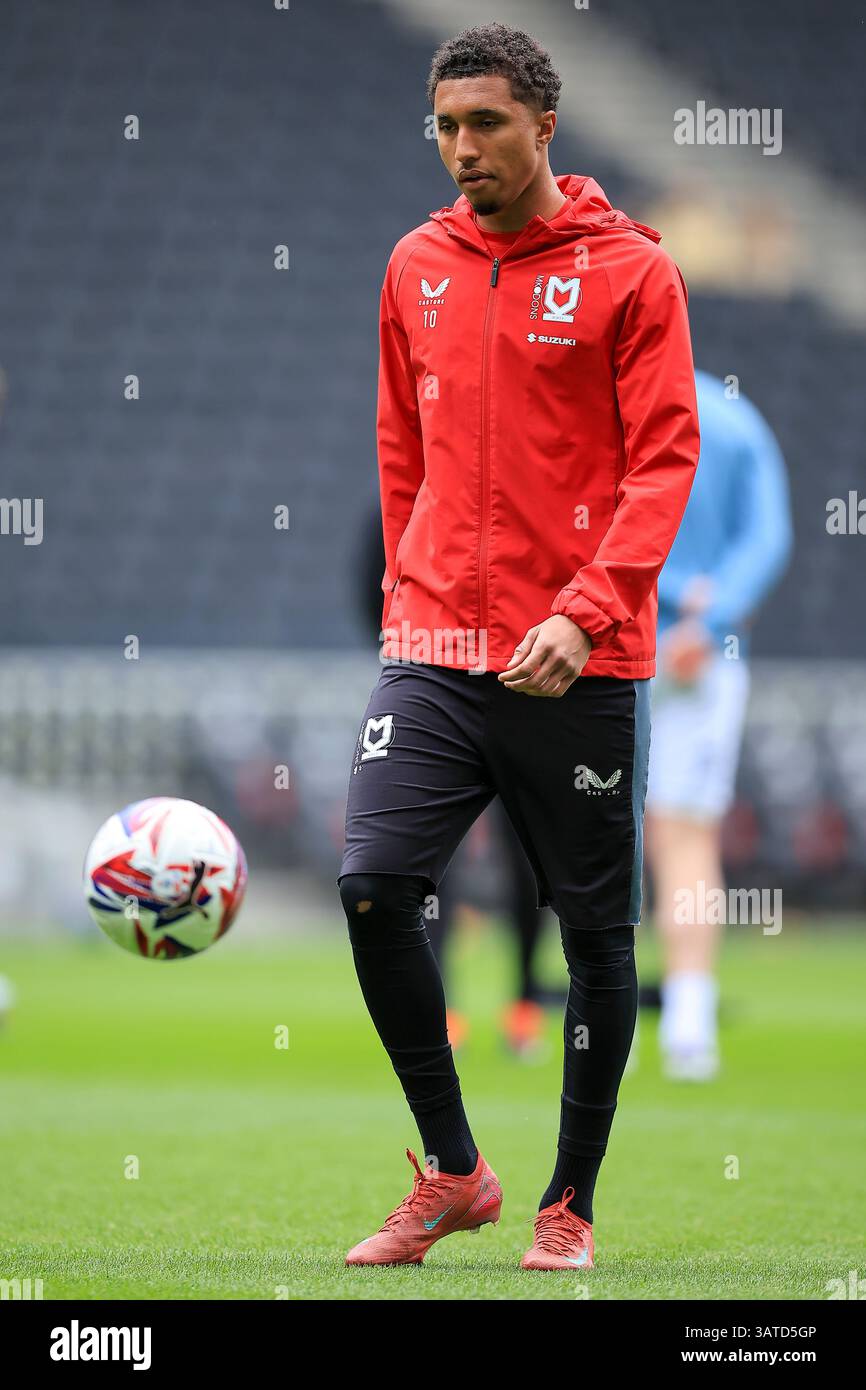 Milton Keynes Dons Defender Travis Patterson (66) Warms Up before kick ...