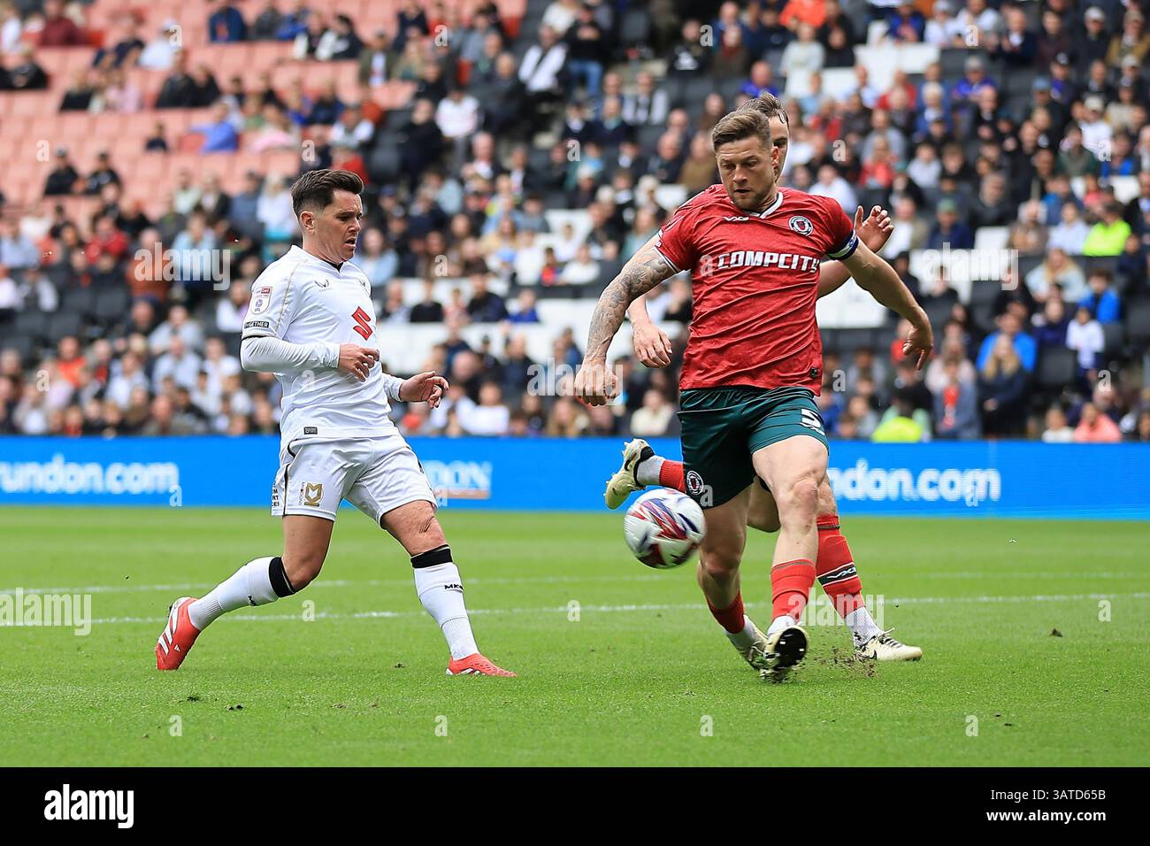 Newport County Defender James Clarke (5) Under Pressure from Milton ...