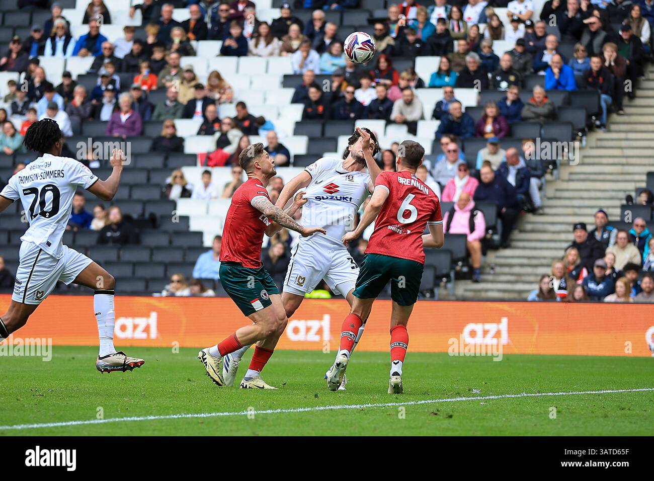 PENALTY APPEAL Milton Keynes Dons Defender Jack Sanders (32) has his shirt pulled in the box ...