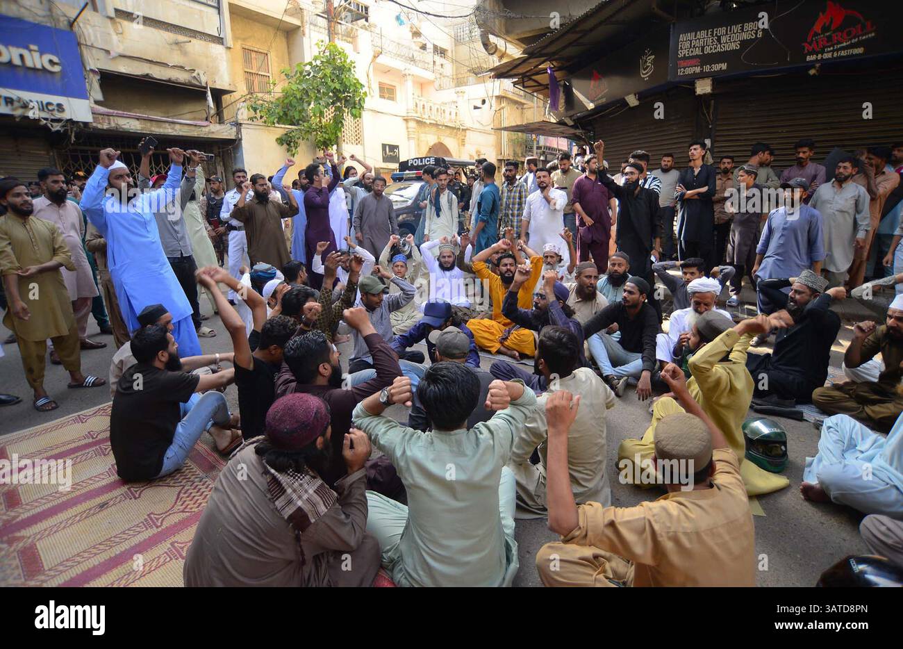 Activists of Tehreek-e-Labbaik (TLP) are chant slogans as they are ...