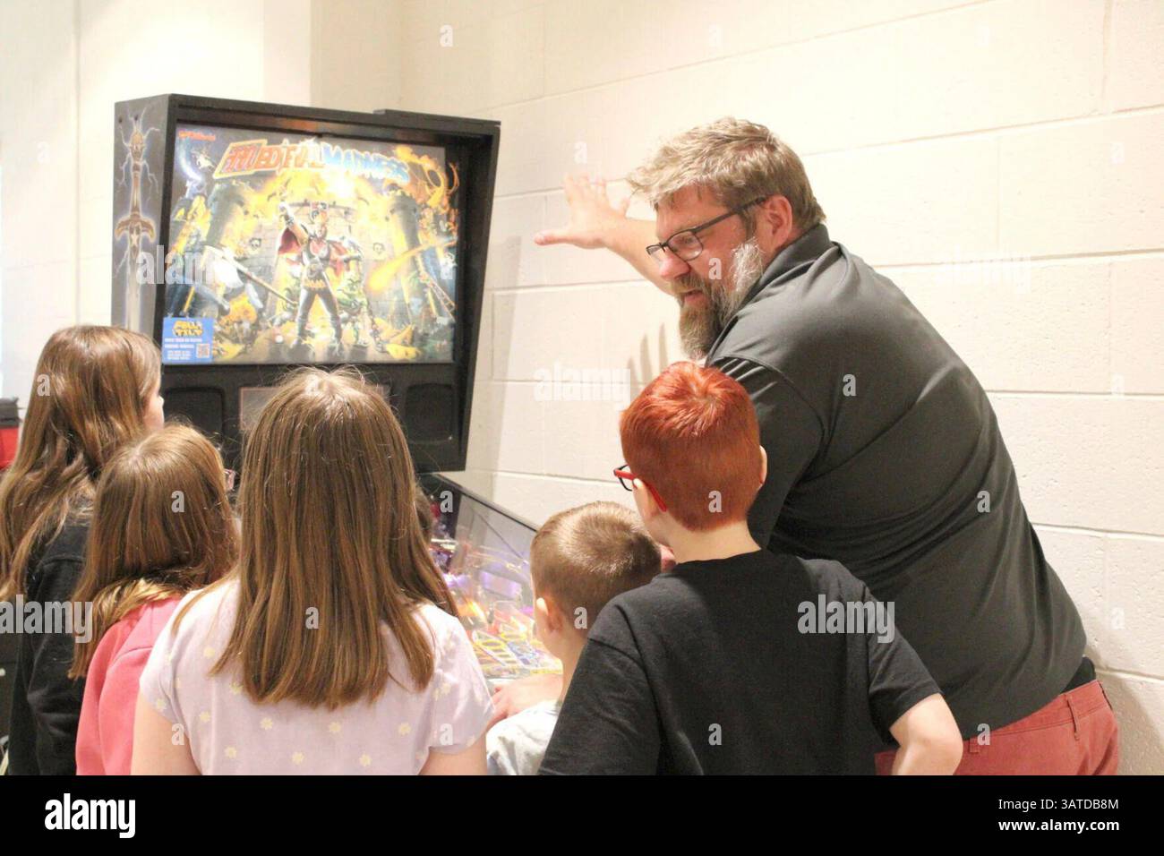 Bringing in a pinball machine from his local arcade, Ben Konowitz ...