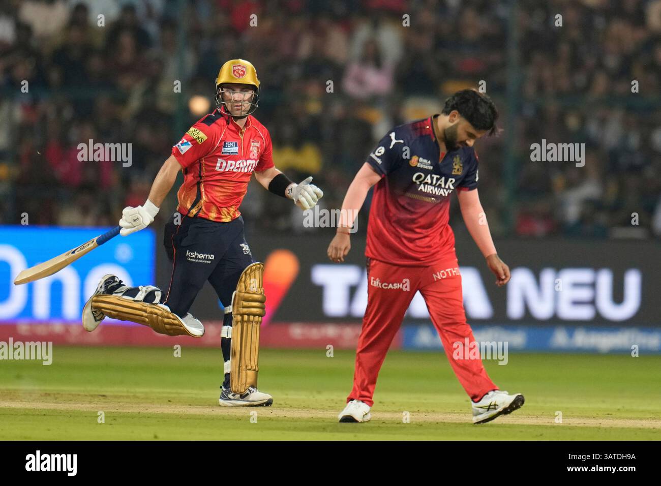 Punjab Kings' Josh Inglis takes a run as Royal Challengers Bengaluru's ...