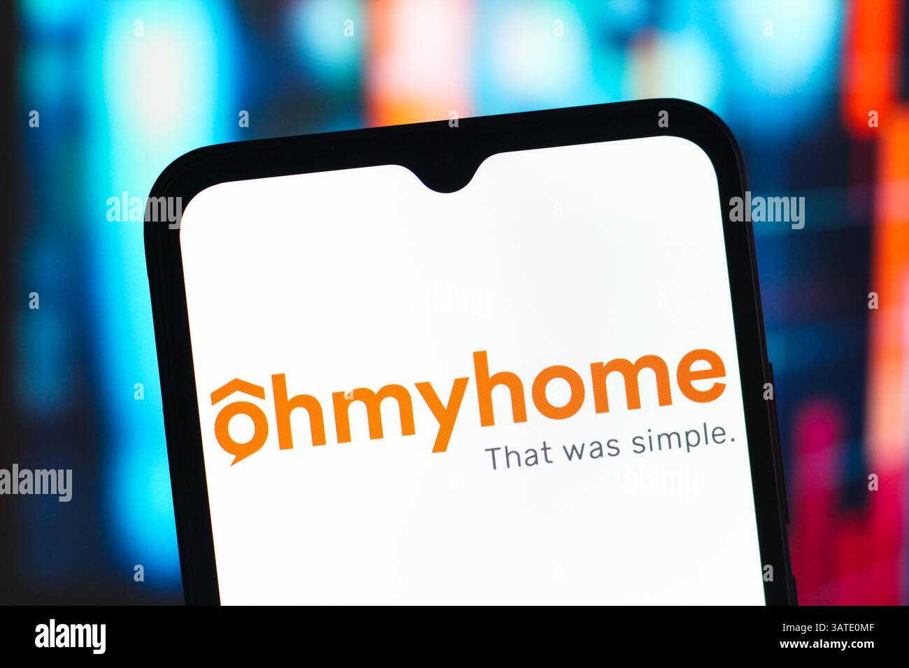 In this photo illustration, the Ohmyhome Limited logo is seen displayed ...