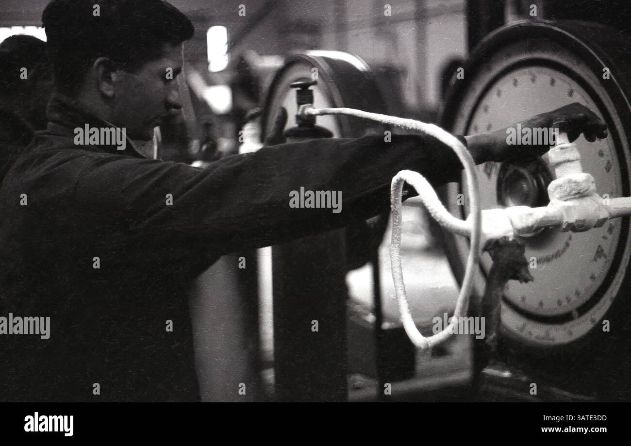 1938, historical, a male worker at a dry ice factory at the South Wales ...