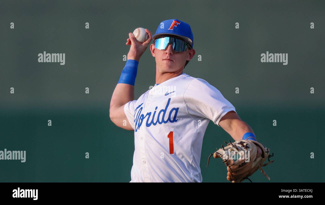 Florida infielder Justin Nadeau (1) warms up before an NCAA baseball ...