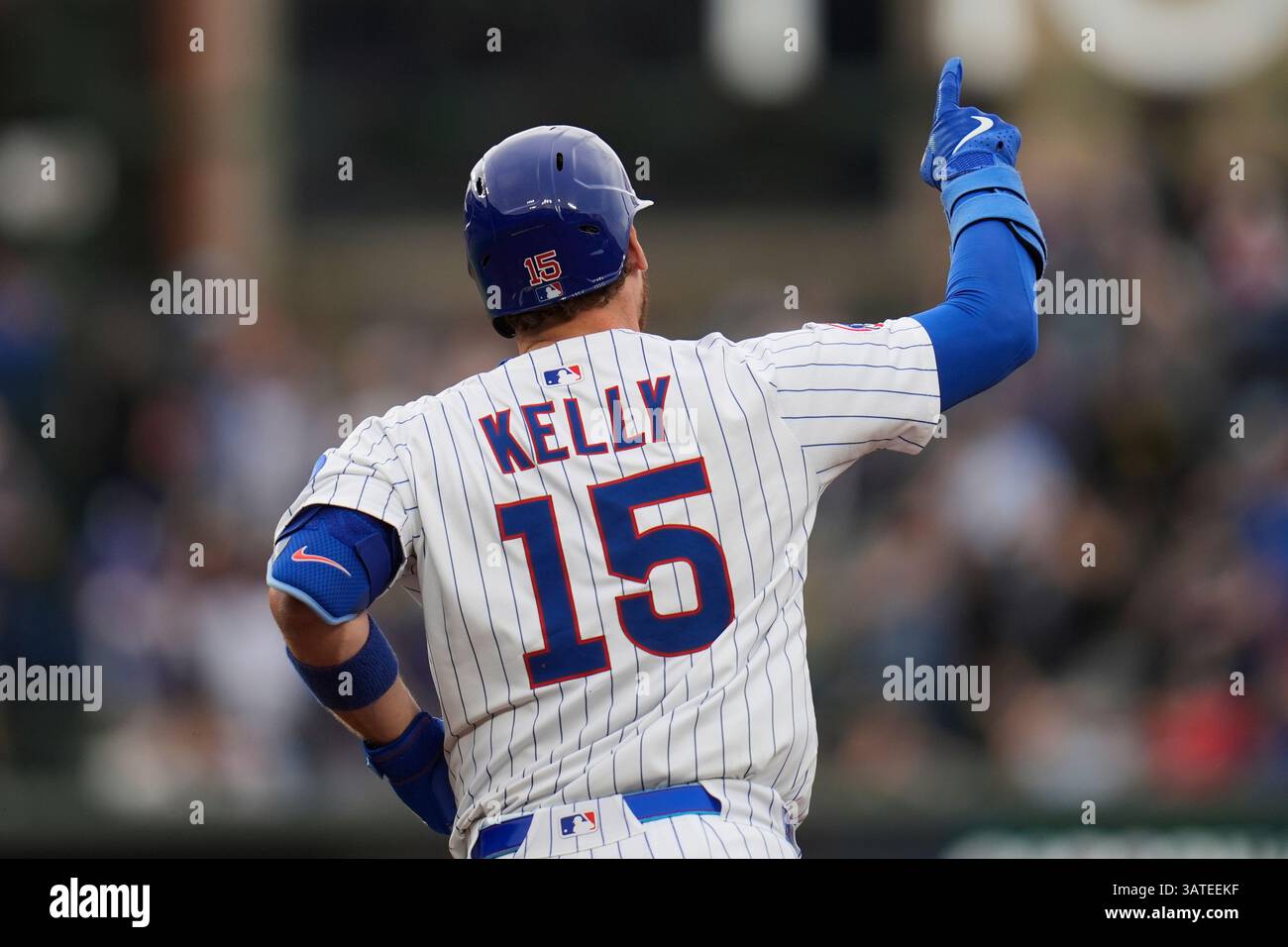 Chicago Cubs' Carson Kelly (15) runs the bases after hitting a two-run ...