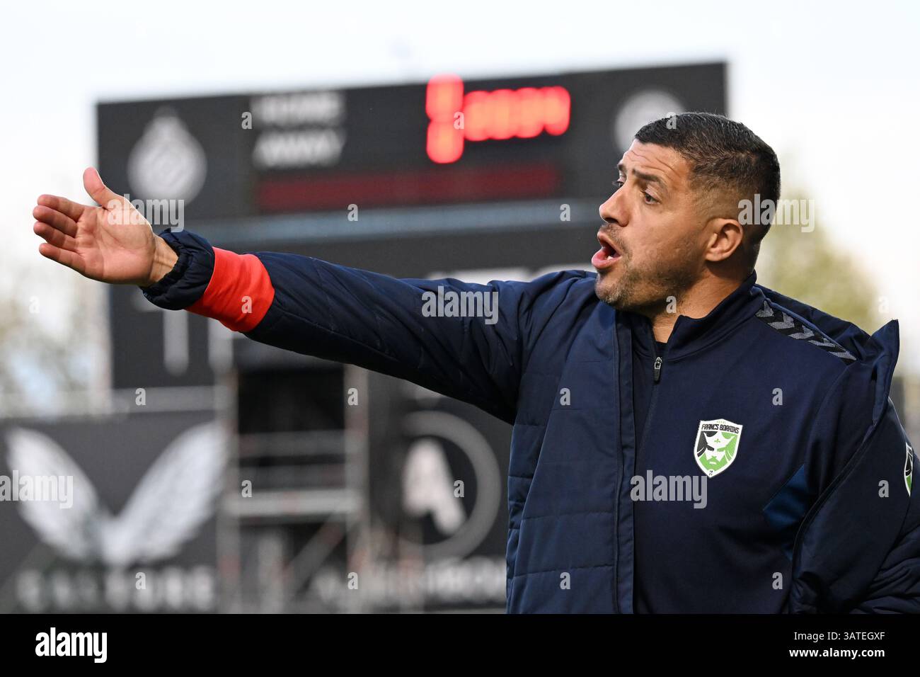 Roeselare, Belgium. 18th Apr, 2025. Francs Borains' head coach Karim ...